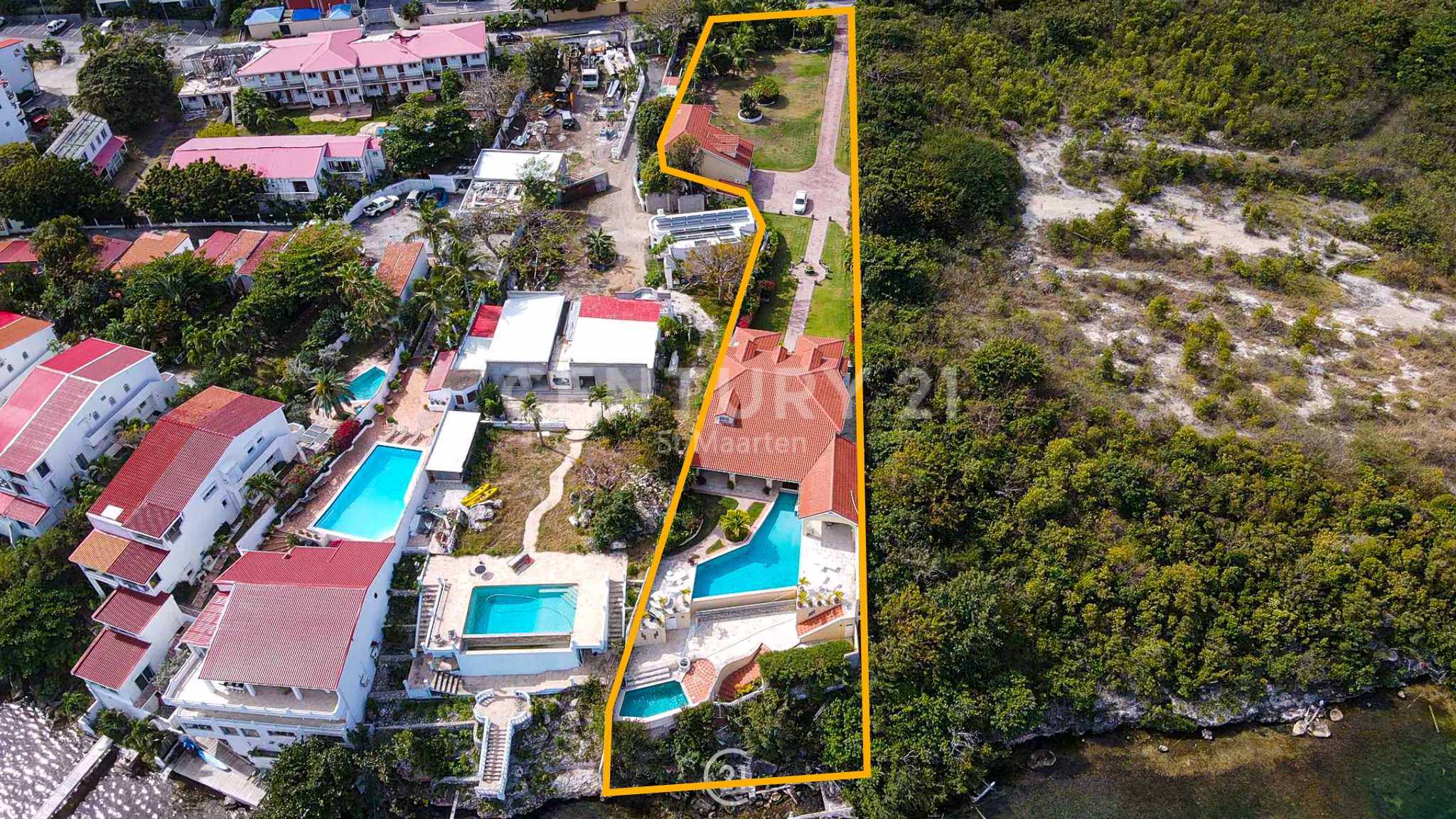 Just Renovated Modern Cupecoy Lagoon Front Villa For Sale For Sale